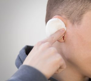 Should I See a Specialist for a Bleeding Ear? - Helping Me Hear