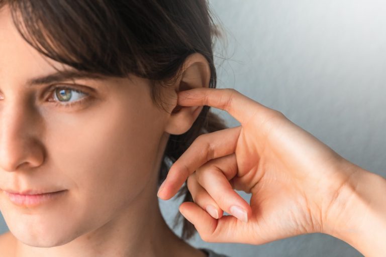 Blocked Ear That Won’t Go Away? Here’s What to Know - Helping Me Hear